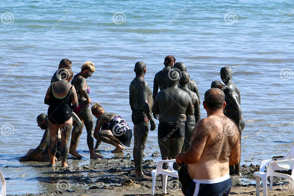 People in the mud editorial photography. Image of tourism - 78109292