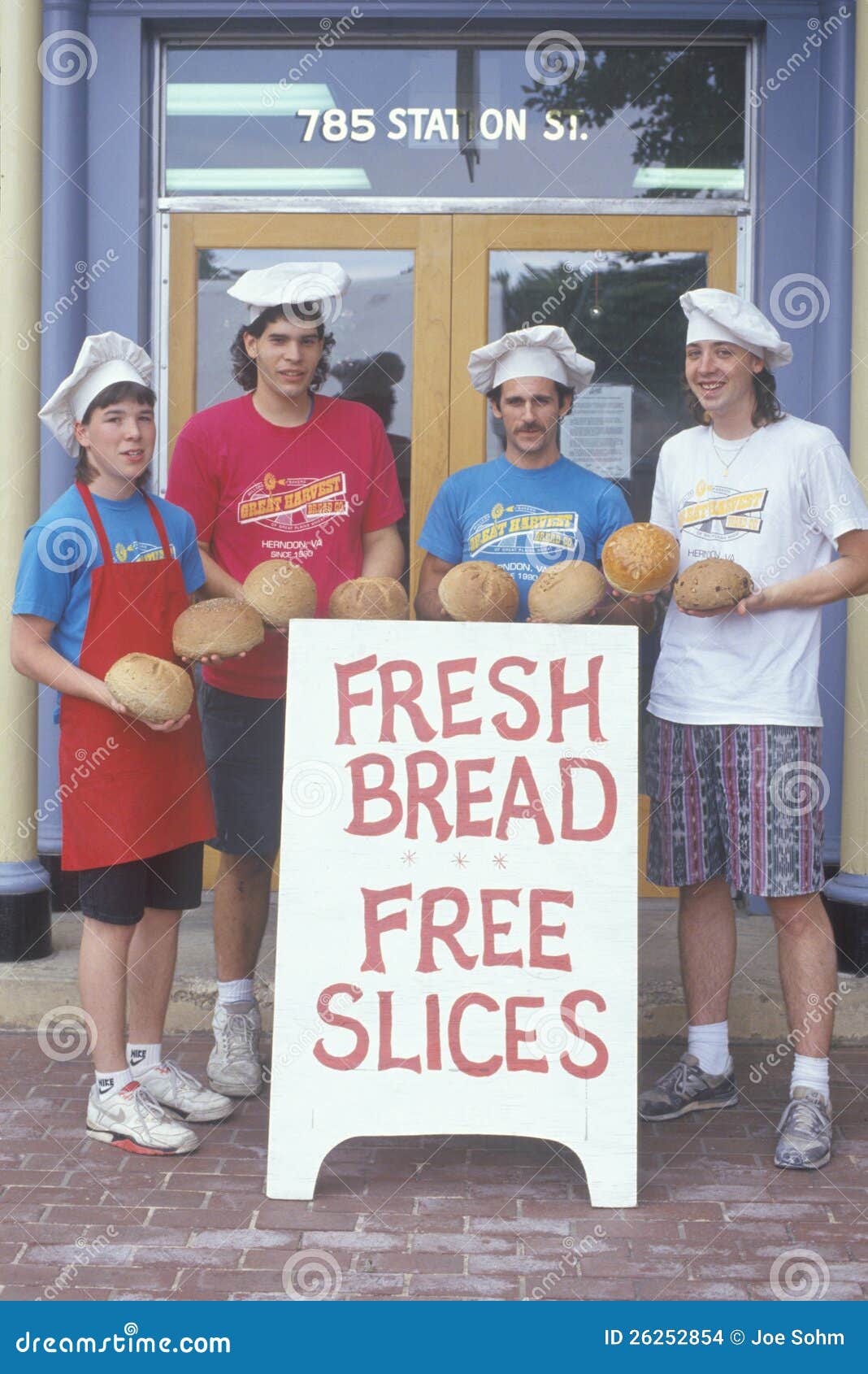 People offering bread editorial stock image. Image of america - 26252854