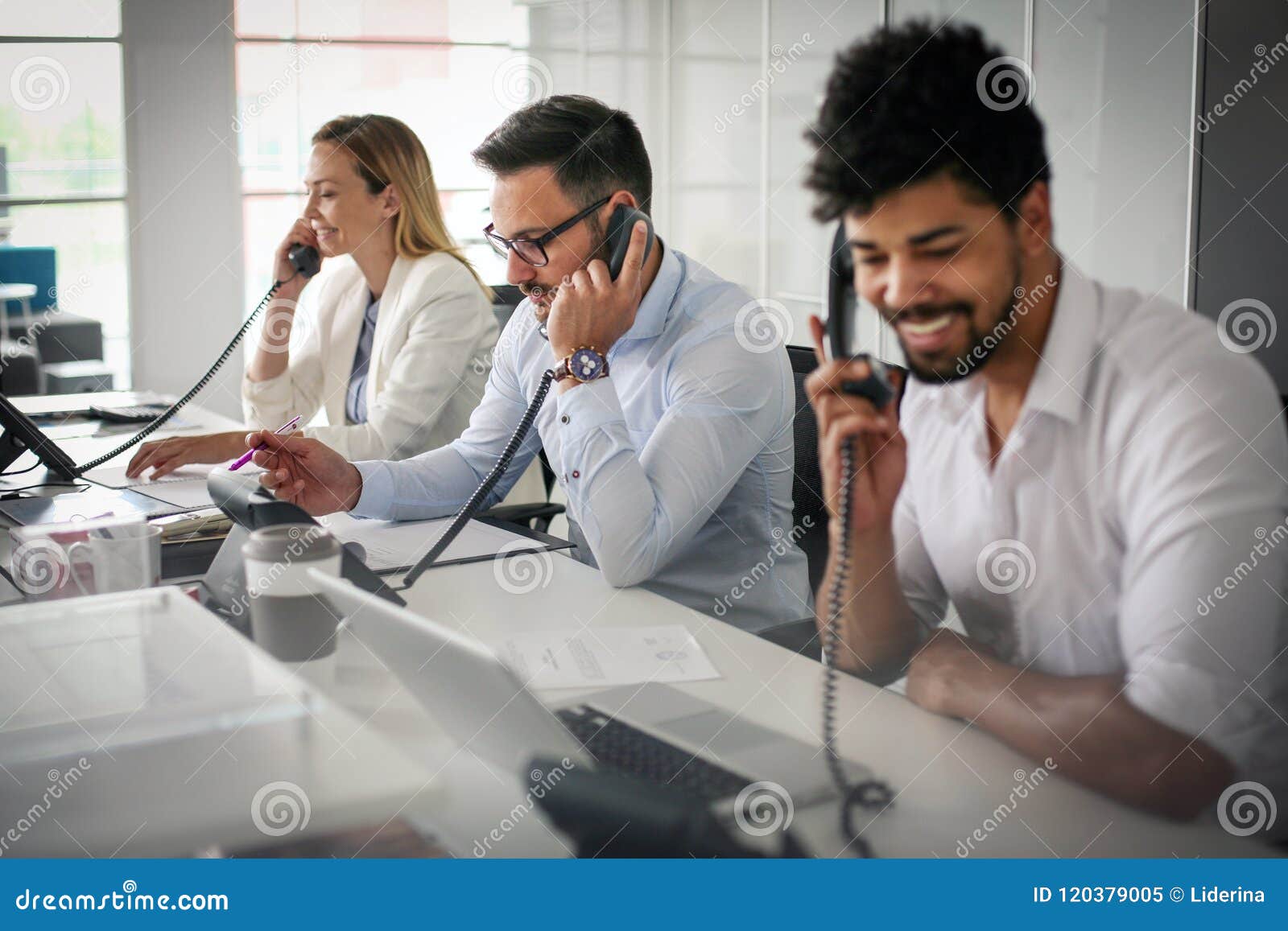 People in Operations Center Talking on Landline Phone. Operator Stock ...