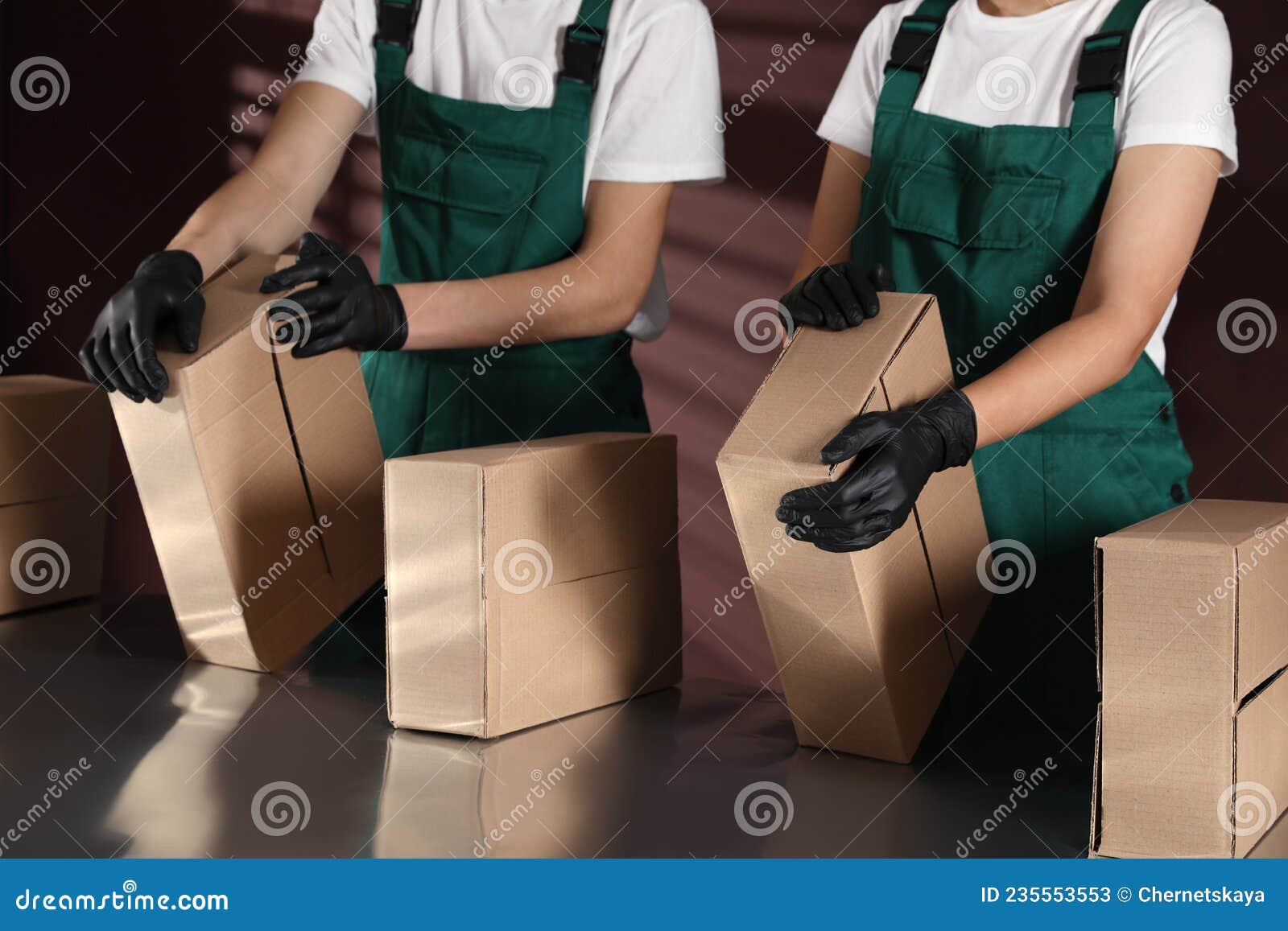 People Packing Cardboard Boxes at Production Line, Closeup Stock Image ...
