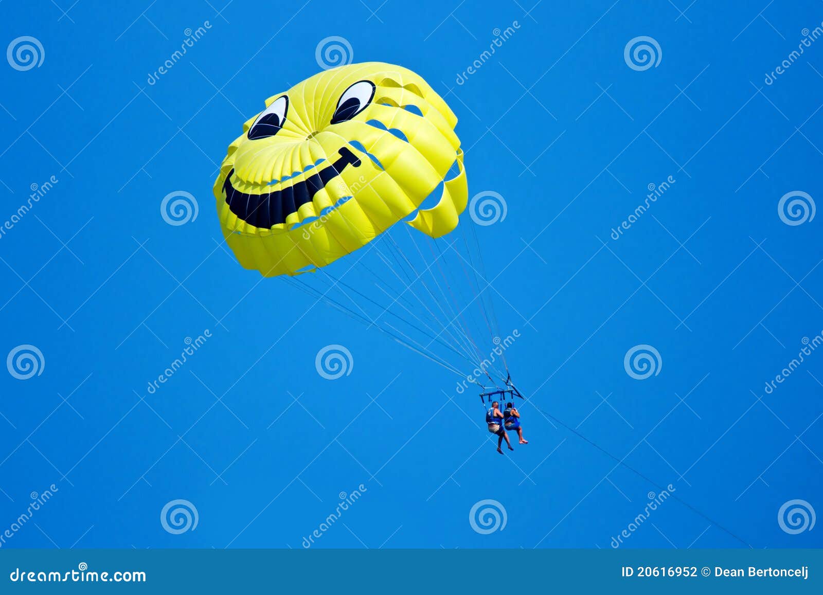 People on Parachute with Smiley Face Stock Photo - Image of tourists ...