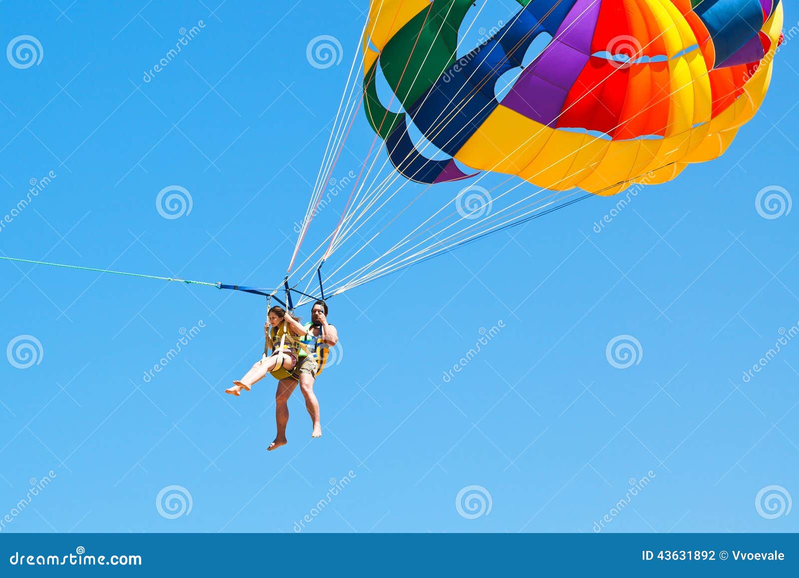 People Parakiting on Parachute in Blue Sky Stock Photo - Image of blue ...