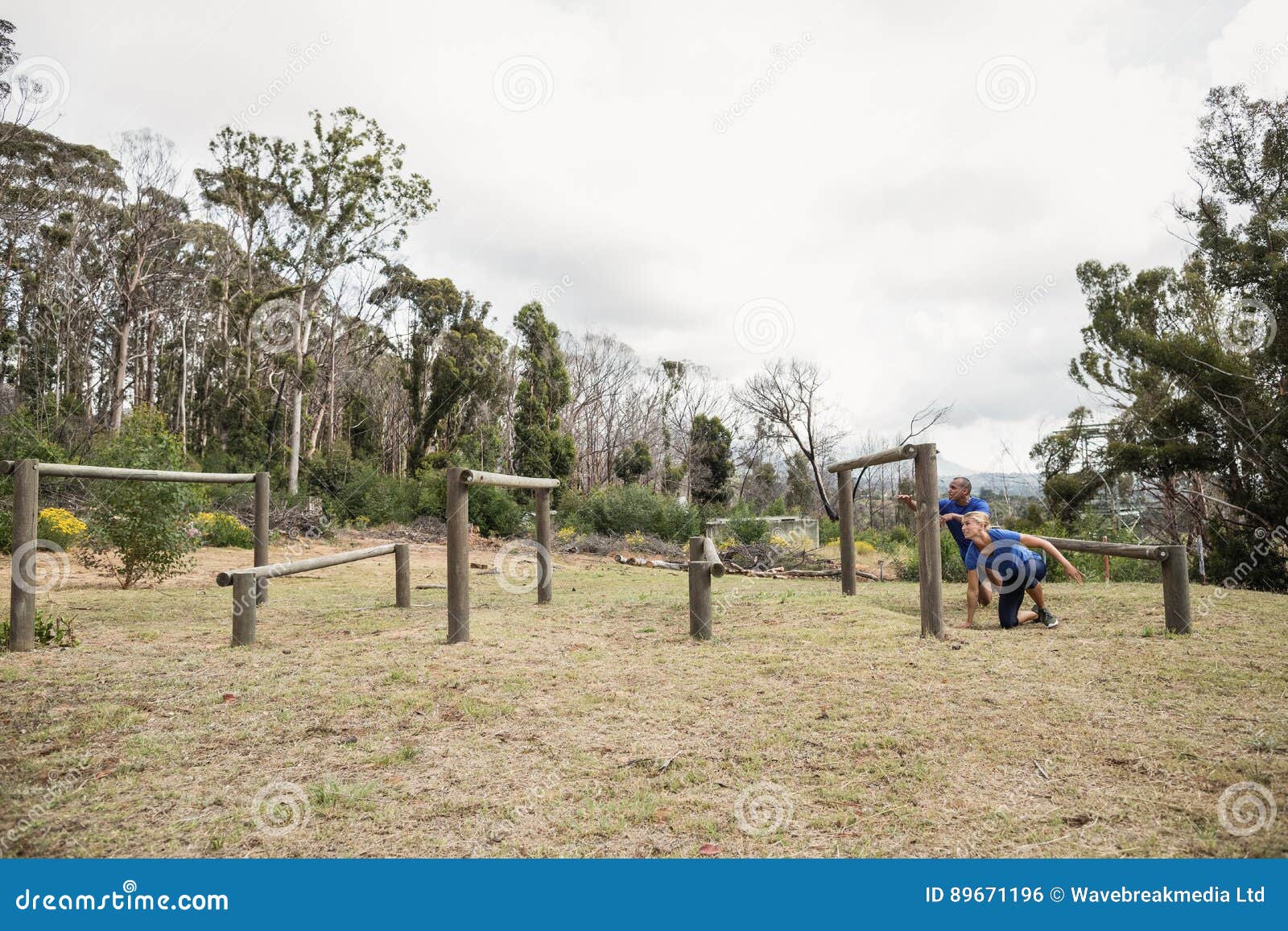 People Passing through Hurdles during Obstacle Course Stock Photo ...