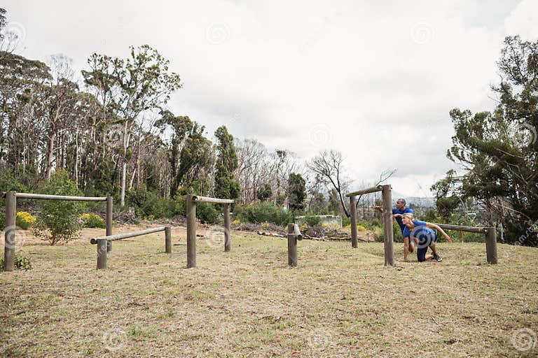 People Passing through Hurdles during Obstacle Course Stock Photo ...