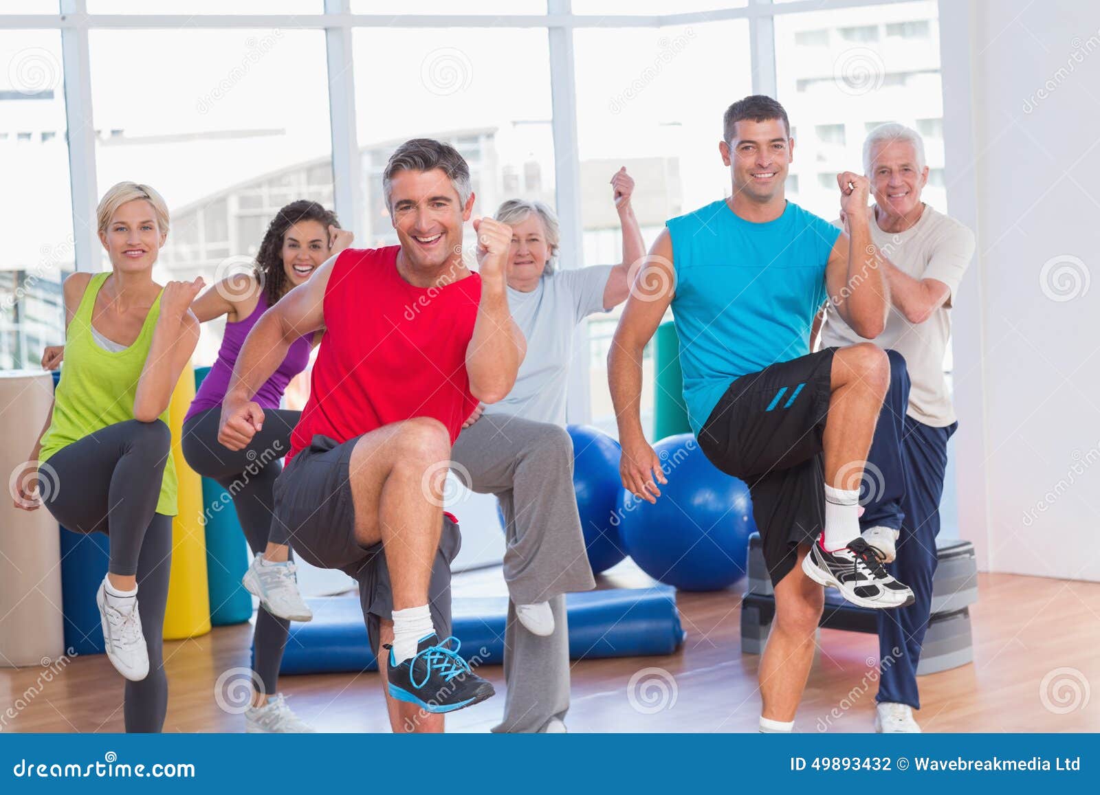 People Performing Aerobics Exercise in Gym Class Stock Photo - Image of ...