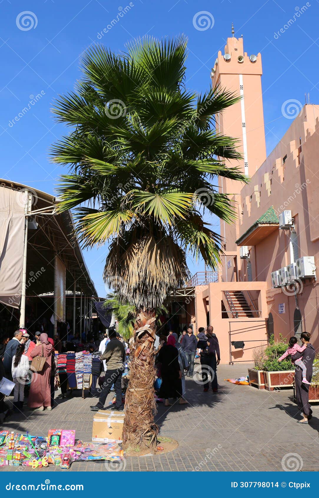 People and Pink Mosque Tower at Local Souk in Agadir, Morocco Editorial ...