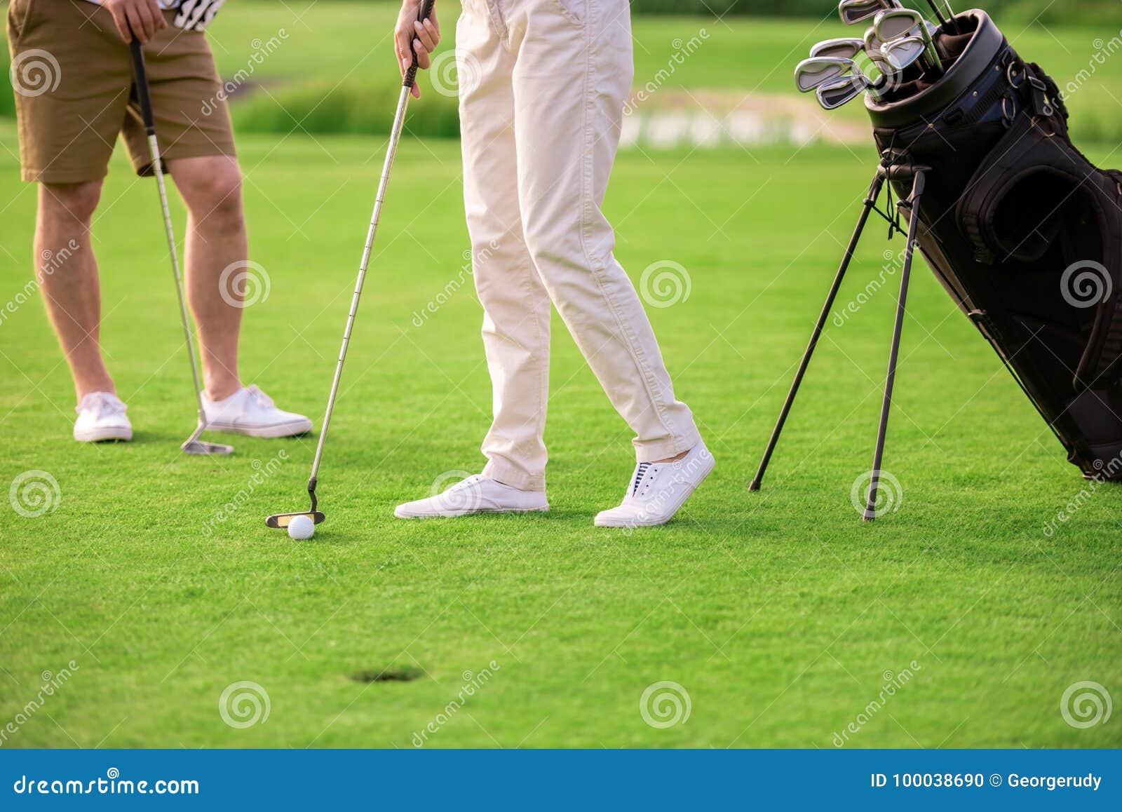 People playing golf stock photo. Image of nature, female - 100038690