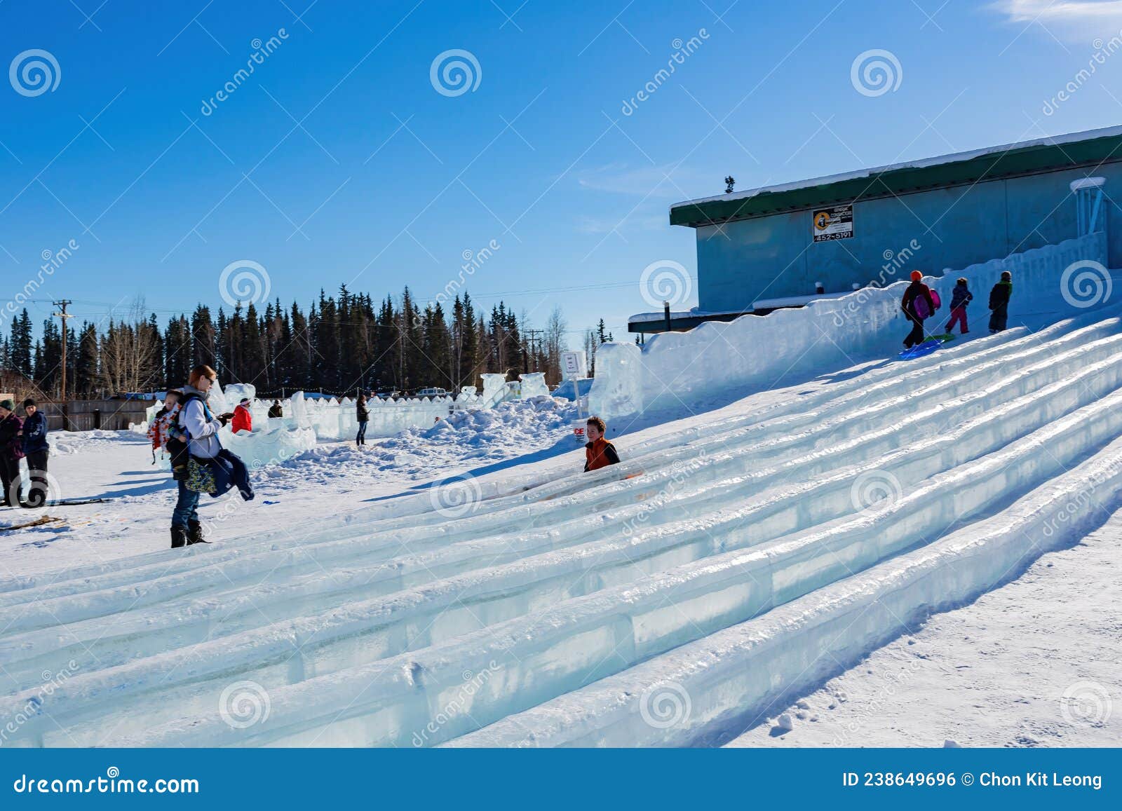 People Playing the Ice Slider Editorial Photo - Image of sunny, nature ...