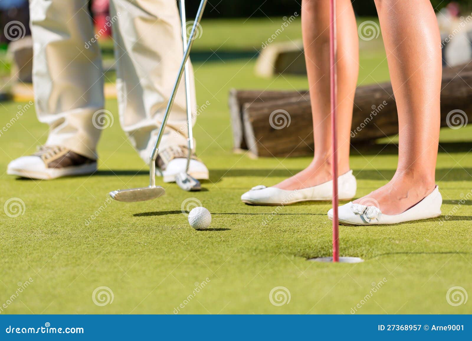 People Playing Miniature Golf Outdoors Stock Image - Image of activity ...