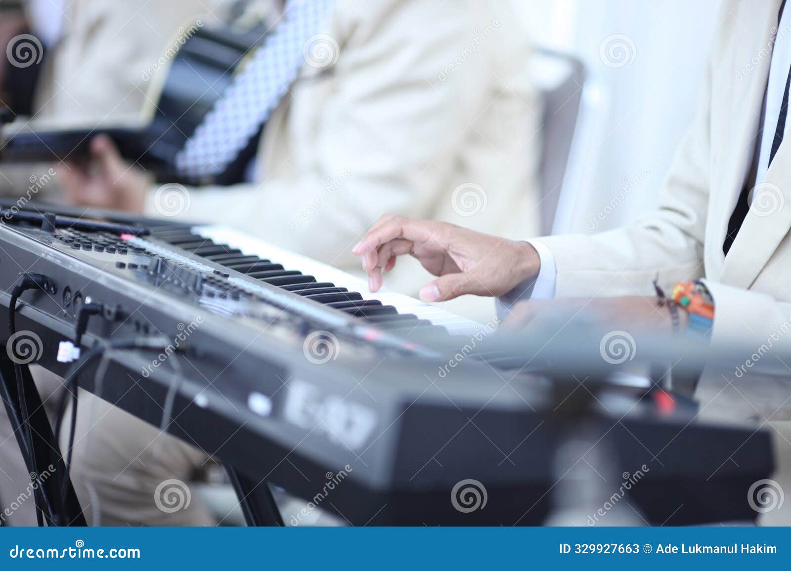 People playing the piano stock image. Image of girl - 329927663