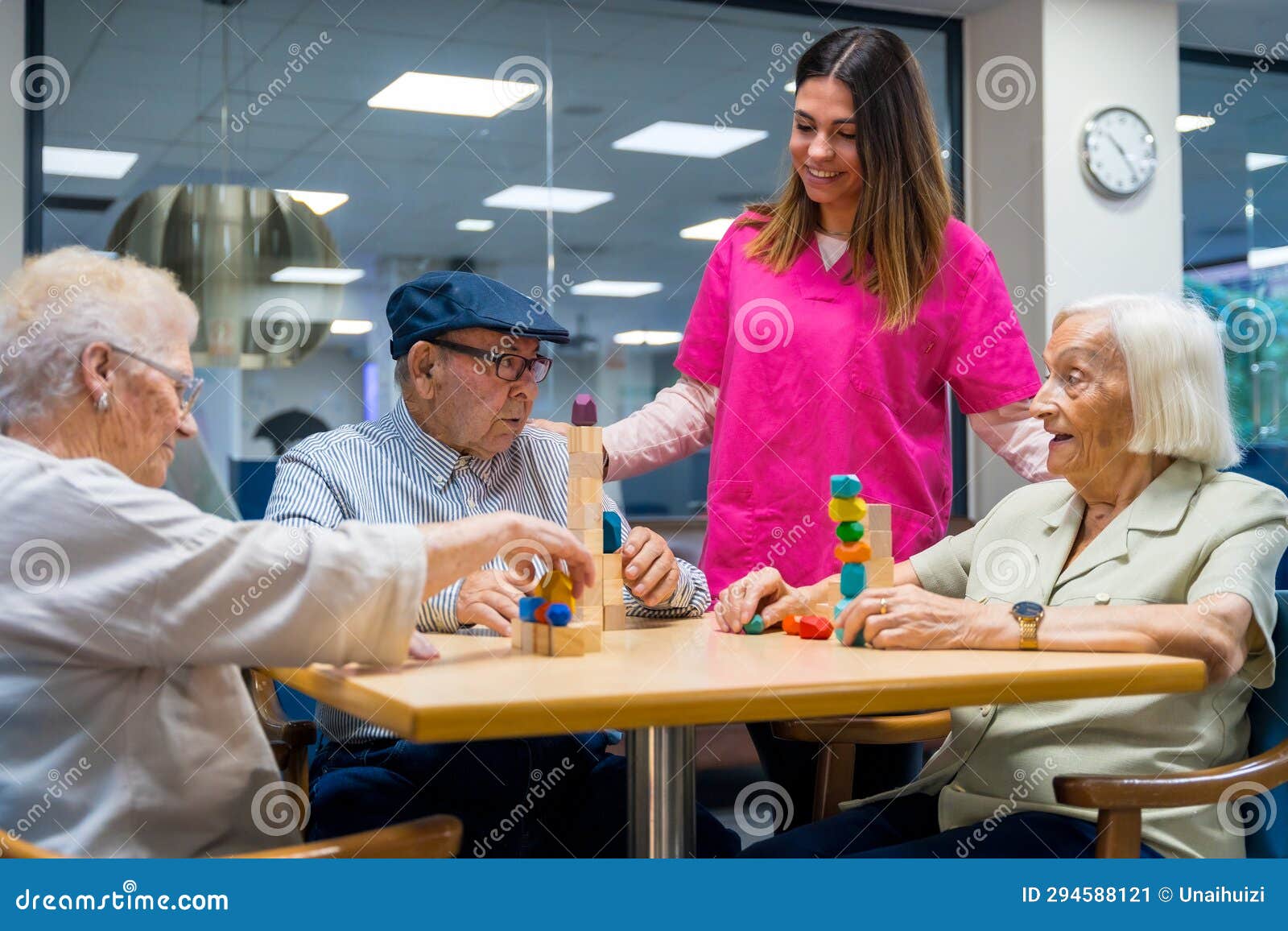 People Playing Skill Games with Nurse in a Nursing Home Stock Image ...