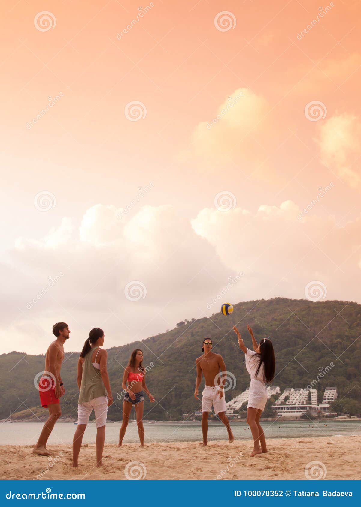 People playing volleyball stock photo. Image of friendship - 100070352