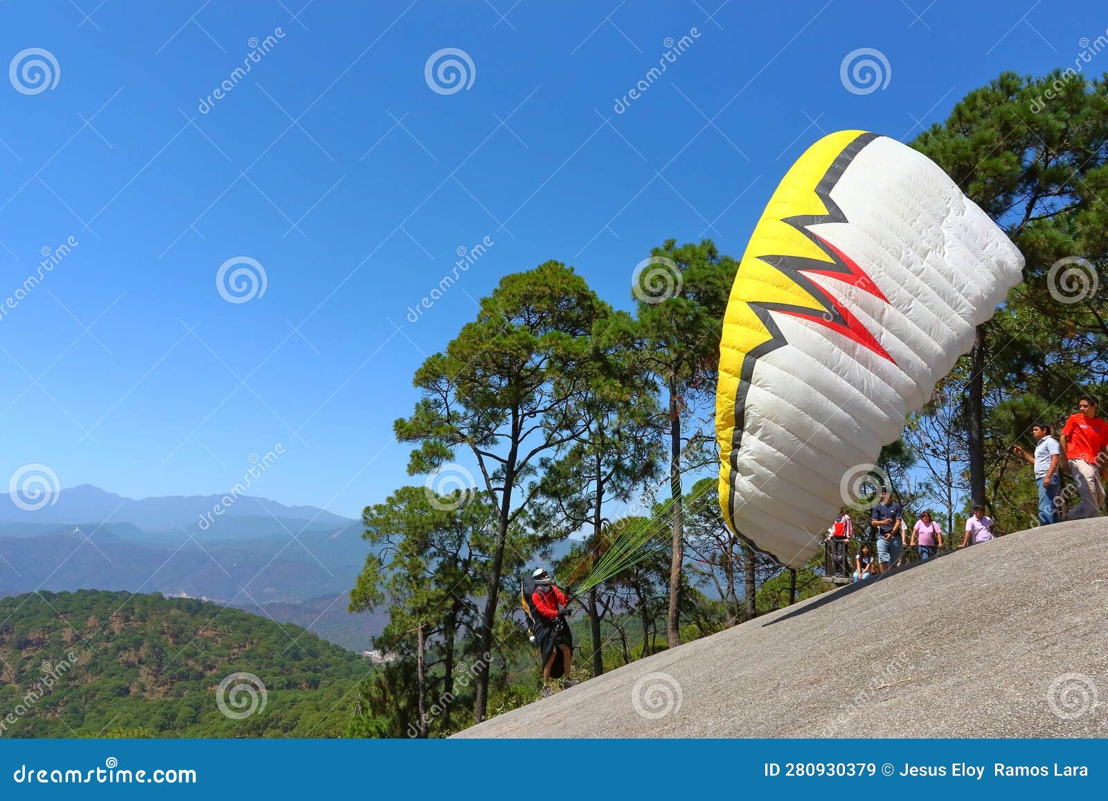 People Practicing Paragliding Over the Lake of Valle De Bravo, Mexico ...