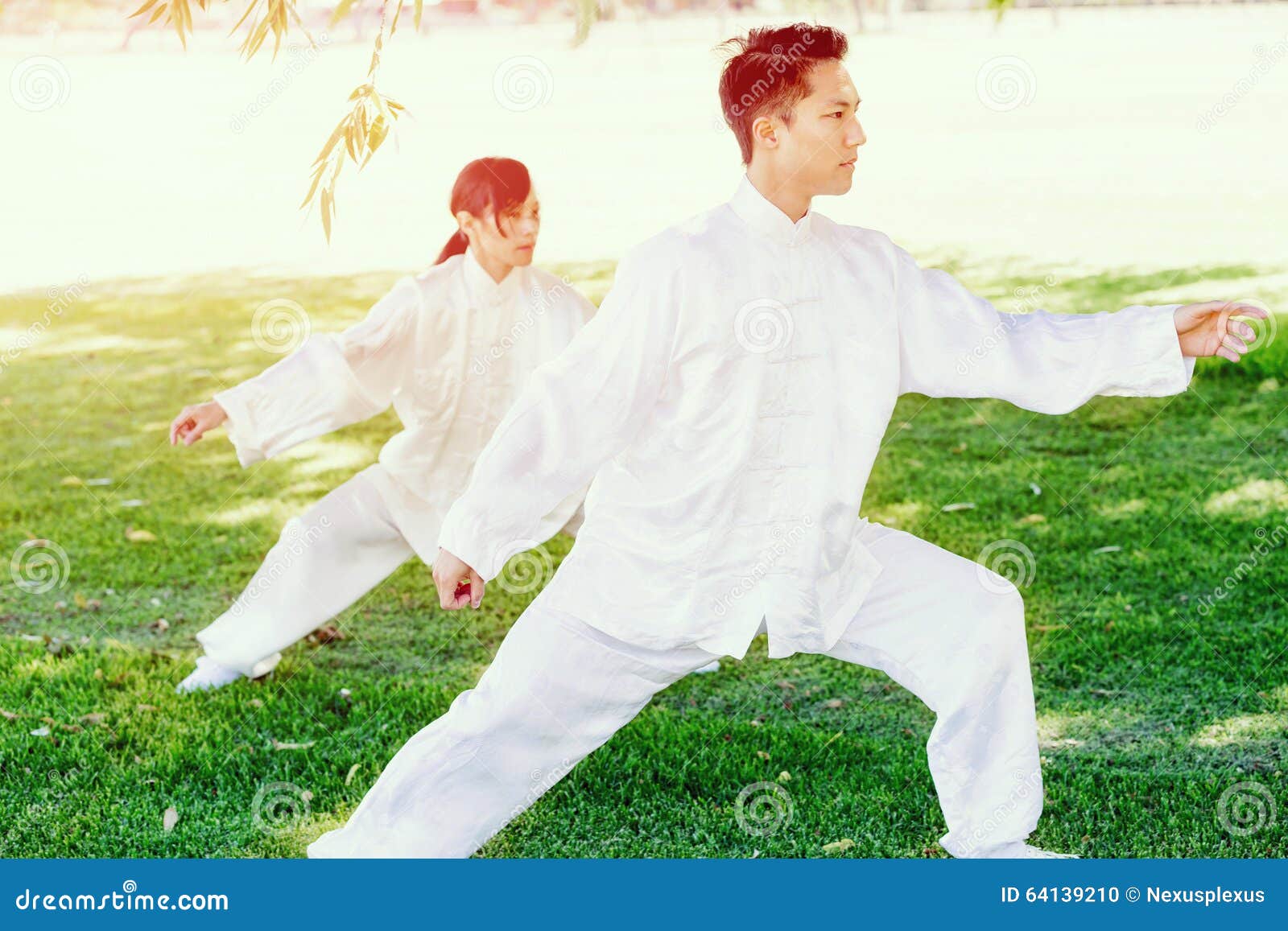 People Practicing Thai Chi in Park Stock Photo - Image of relaxation ...