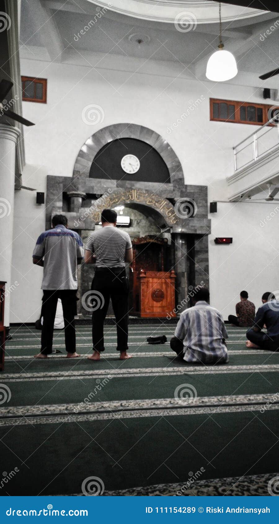 Praying in the mosque editorial stock image. Image of mosque - 111154289