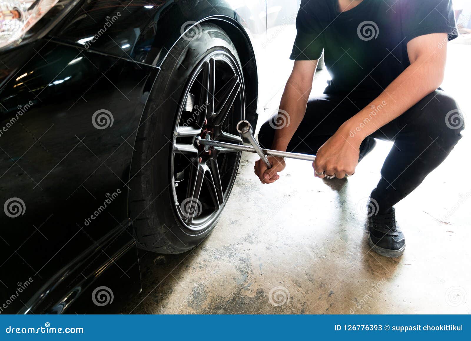 People Professional Mechanic Will Change Tire. Stock Image - Image of ...
