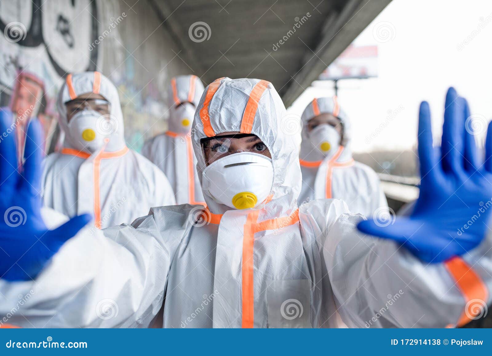 People with Protective Suits and Respirators Outdoors, Coronavirus ...