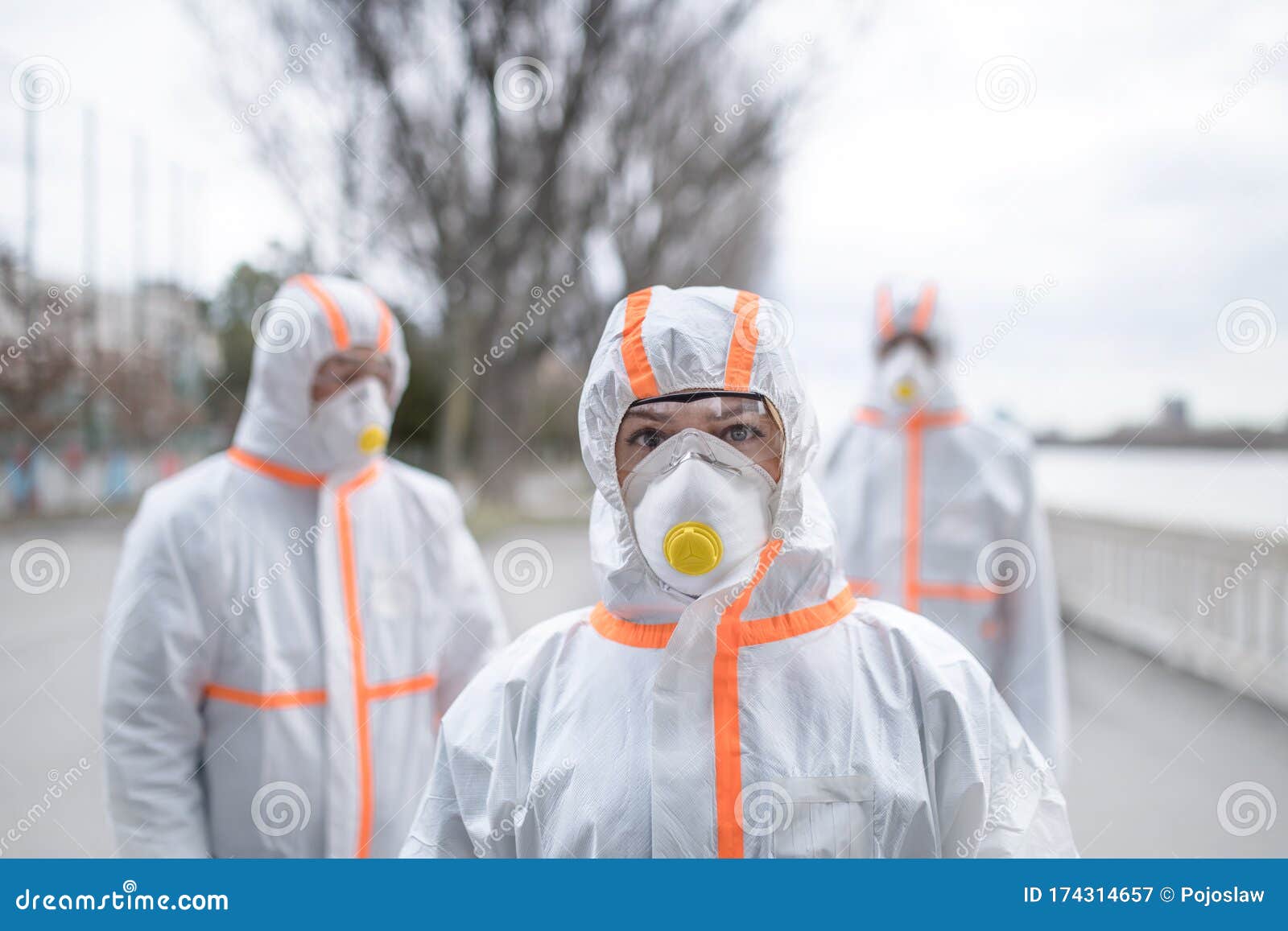 People with Protective Suits and Respirators Outdoors, Coronavirus ...