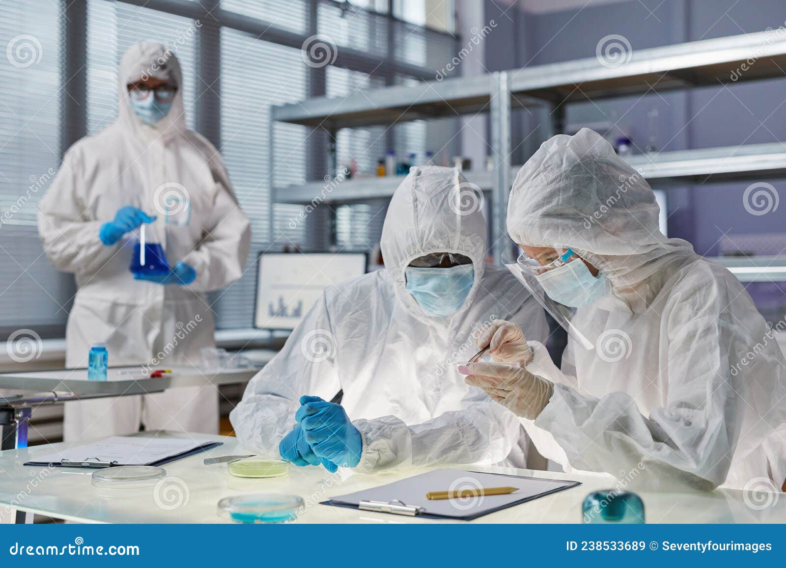 People in Protective Wear Working in the Laboratory Stock Image - Image ...