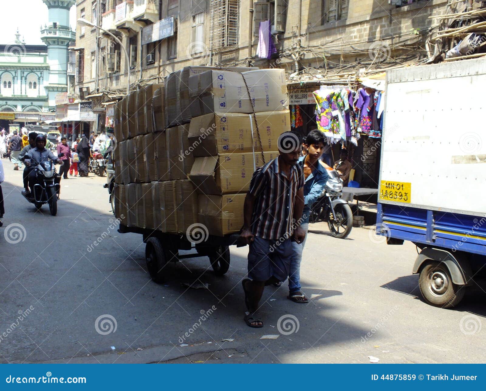 People Pulling Cart of Boxes Editorial Stock Image - Image of pulling ...