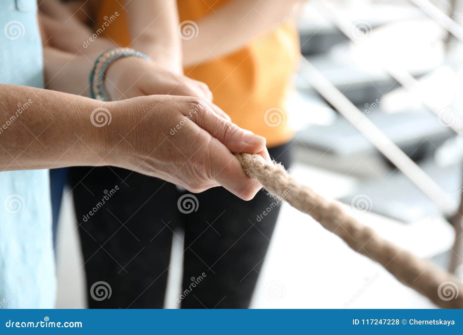People Pulling Rope Together, Closeup of Hands Stock Photo - Image of ...