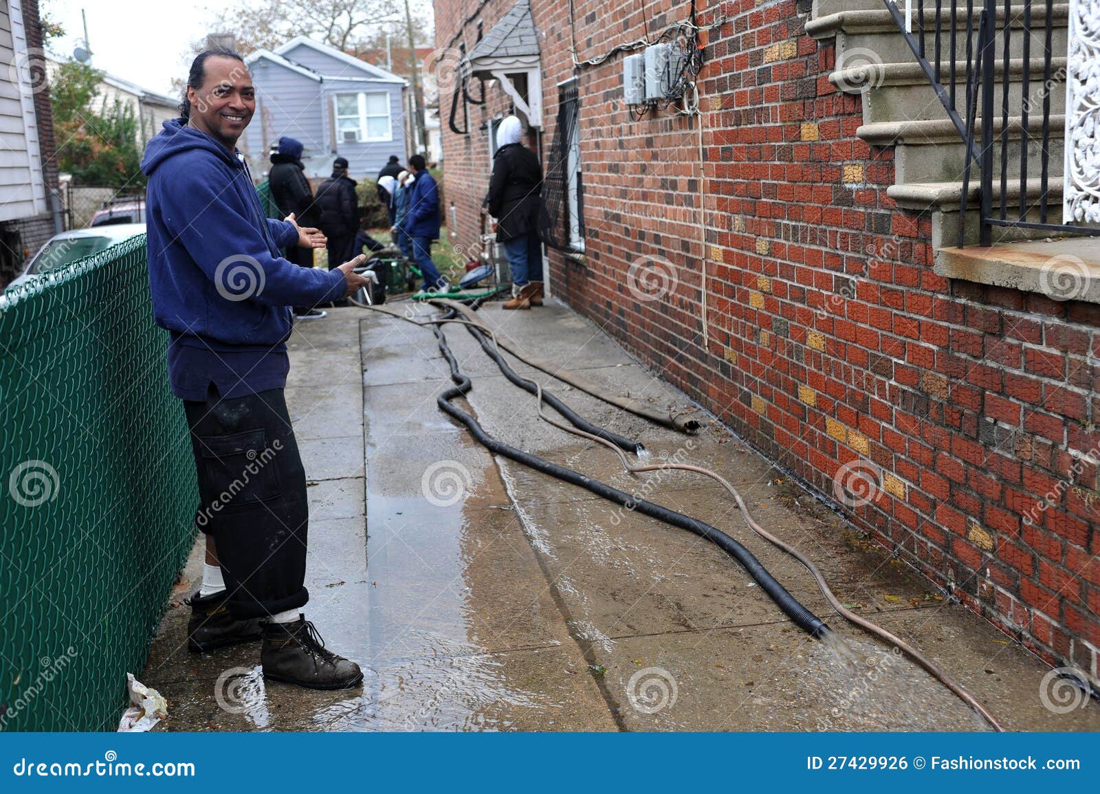 People Pumping Water Out of Building Basement Editorial Photo - Image ...