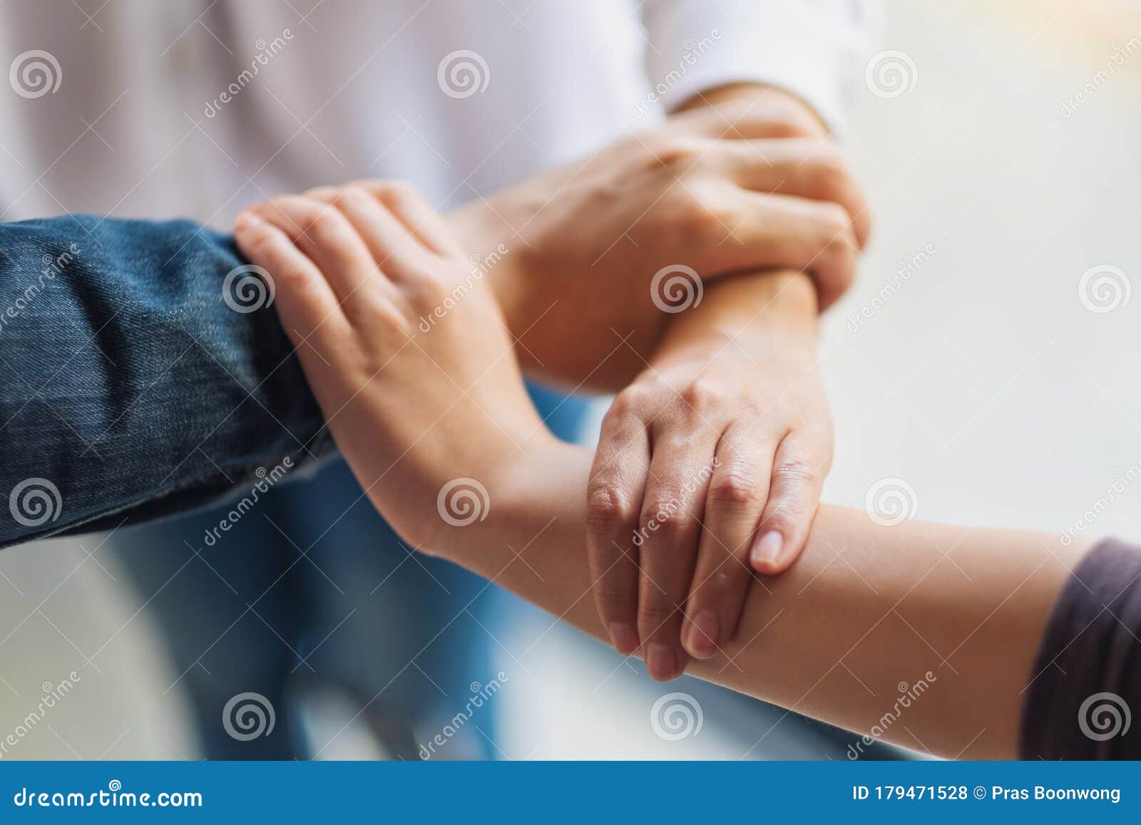 People Putting Their Hands in a Circle Together for Unity Concept Stock ...