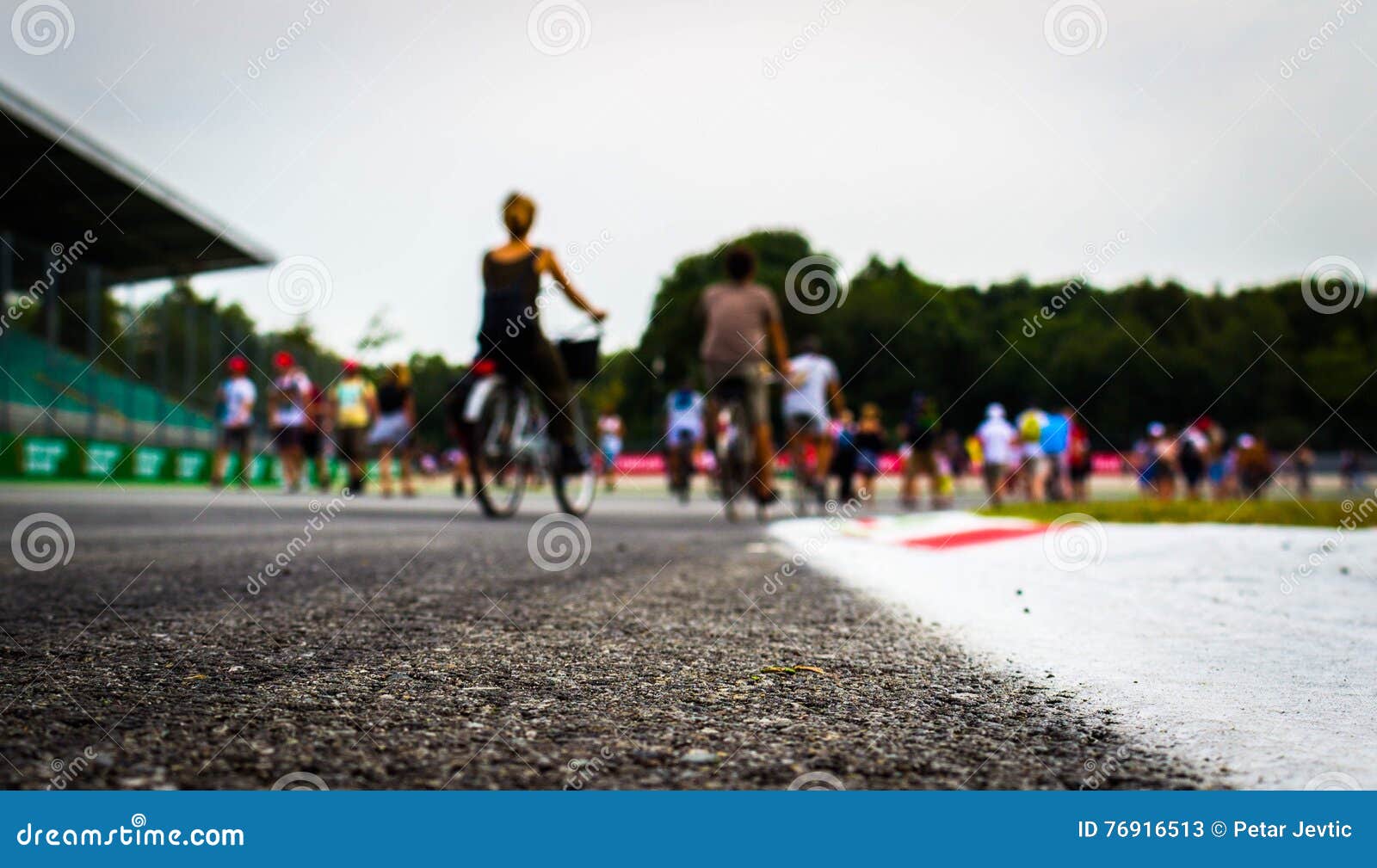 People on racing track stock image. Image of action, formula1 - 76916513