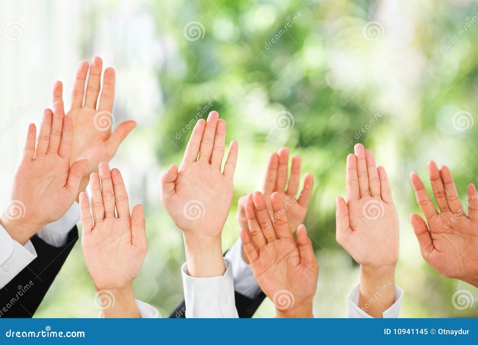 People Raise Their Hands Up Over Green Background Stock Image - Image ...