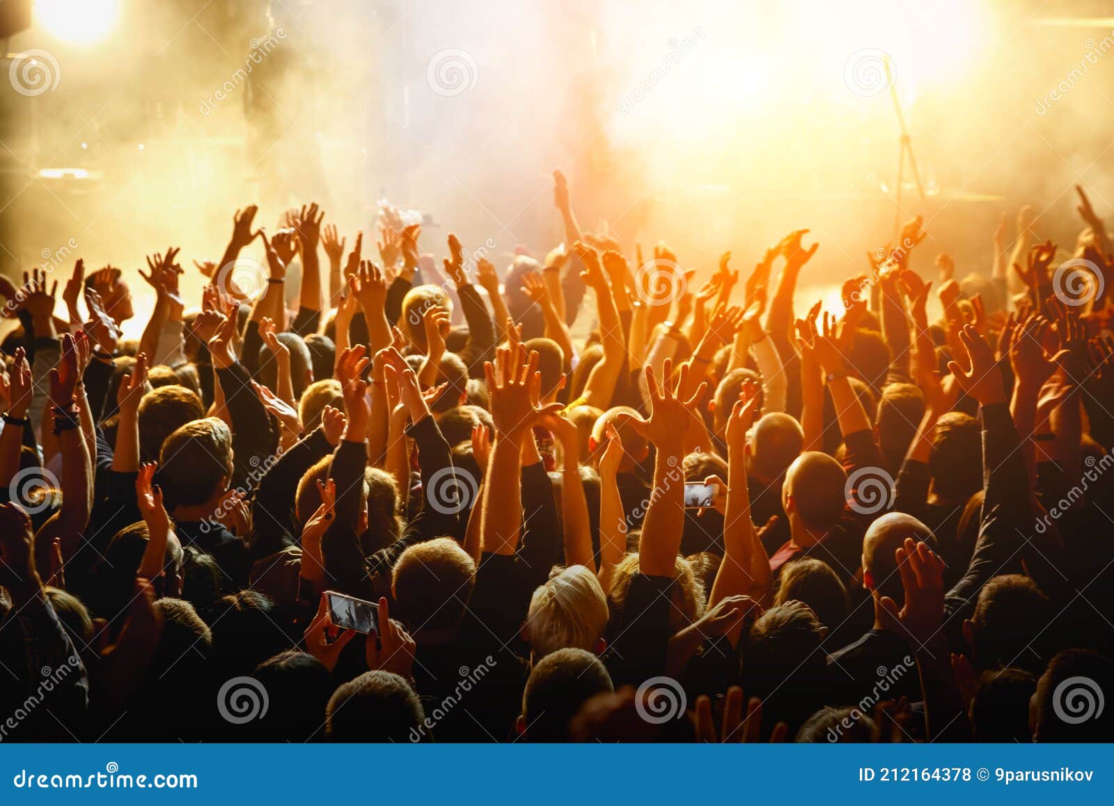 People with Raised Hands at a Public Event. Gathering in Concert Hall ...