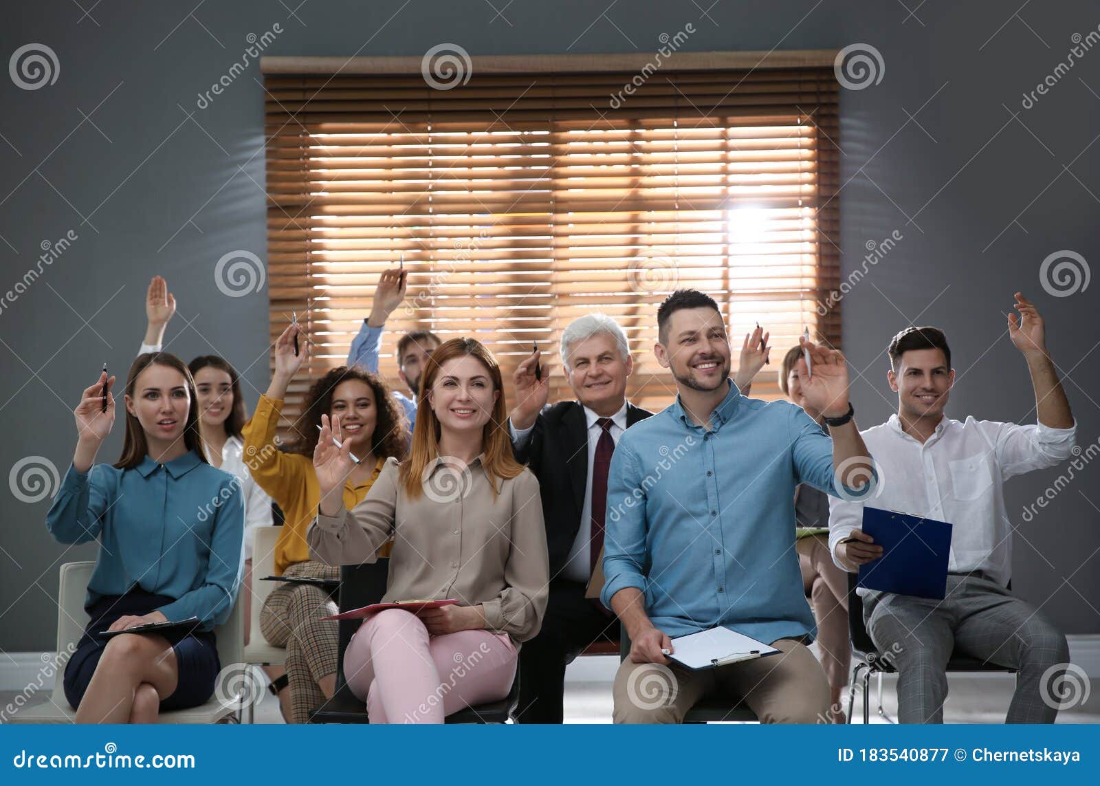 People Raising Hands To Ask Questions at Seminar Stock Image - Image of ...