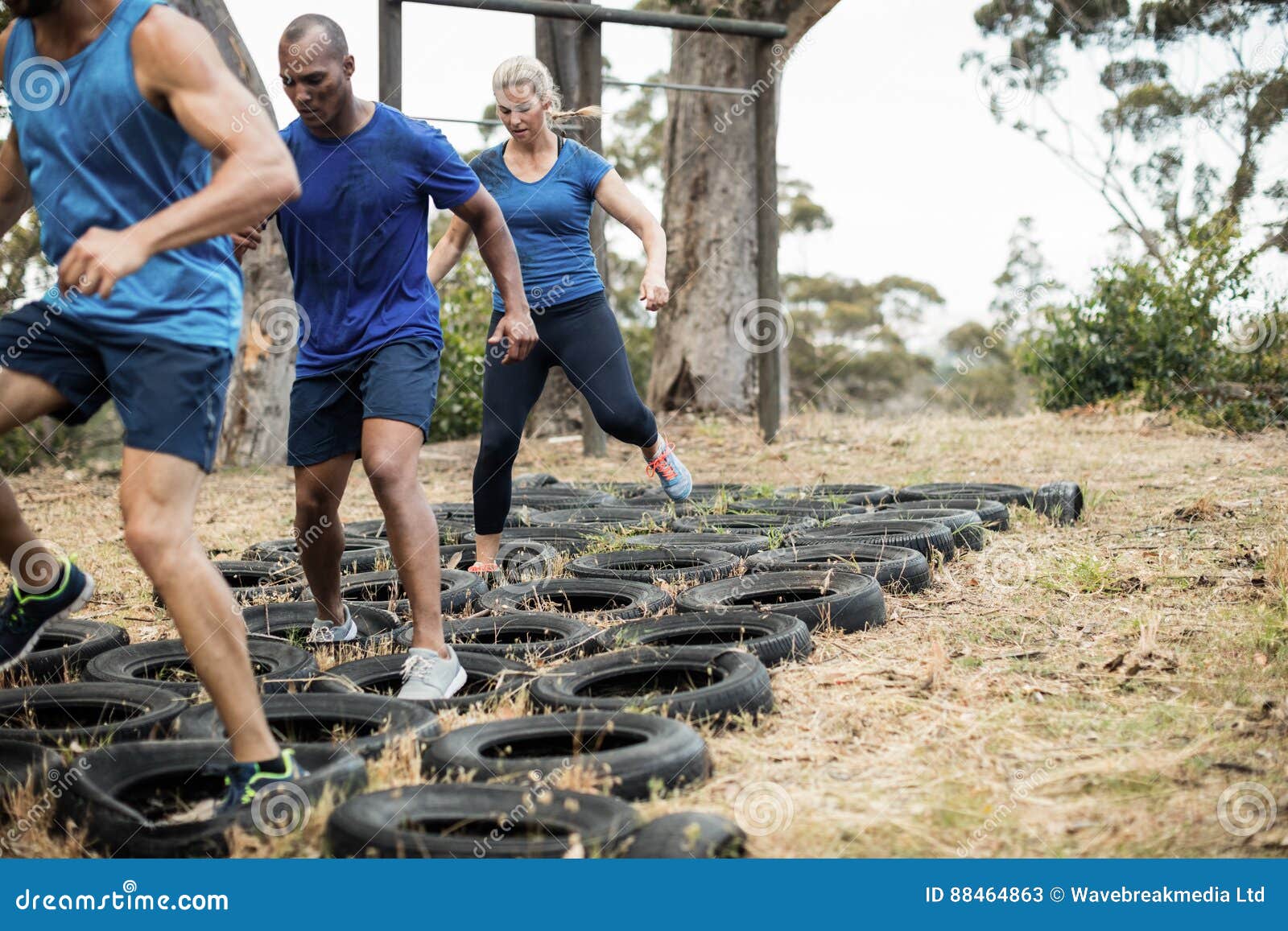 People Receiving Tire Obstacle Course Training Stock Image - Image of ...