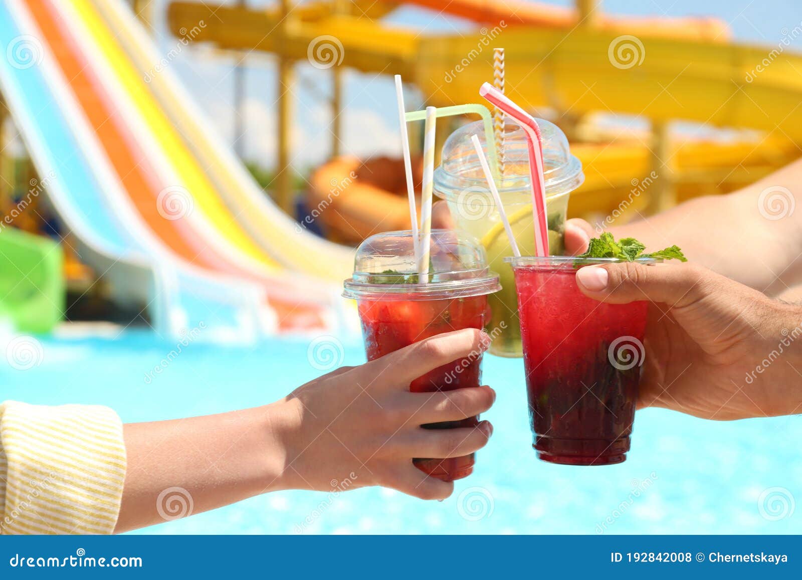 People with Refreshing Drinks in Water Park Stock Photo - Image of male ...