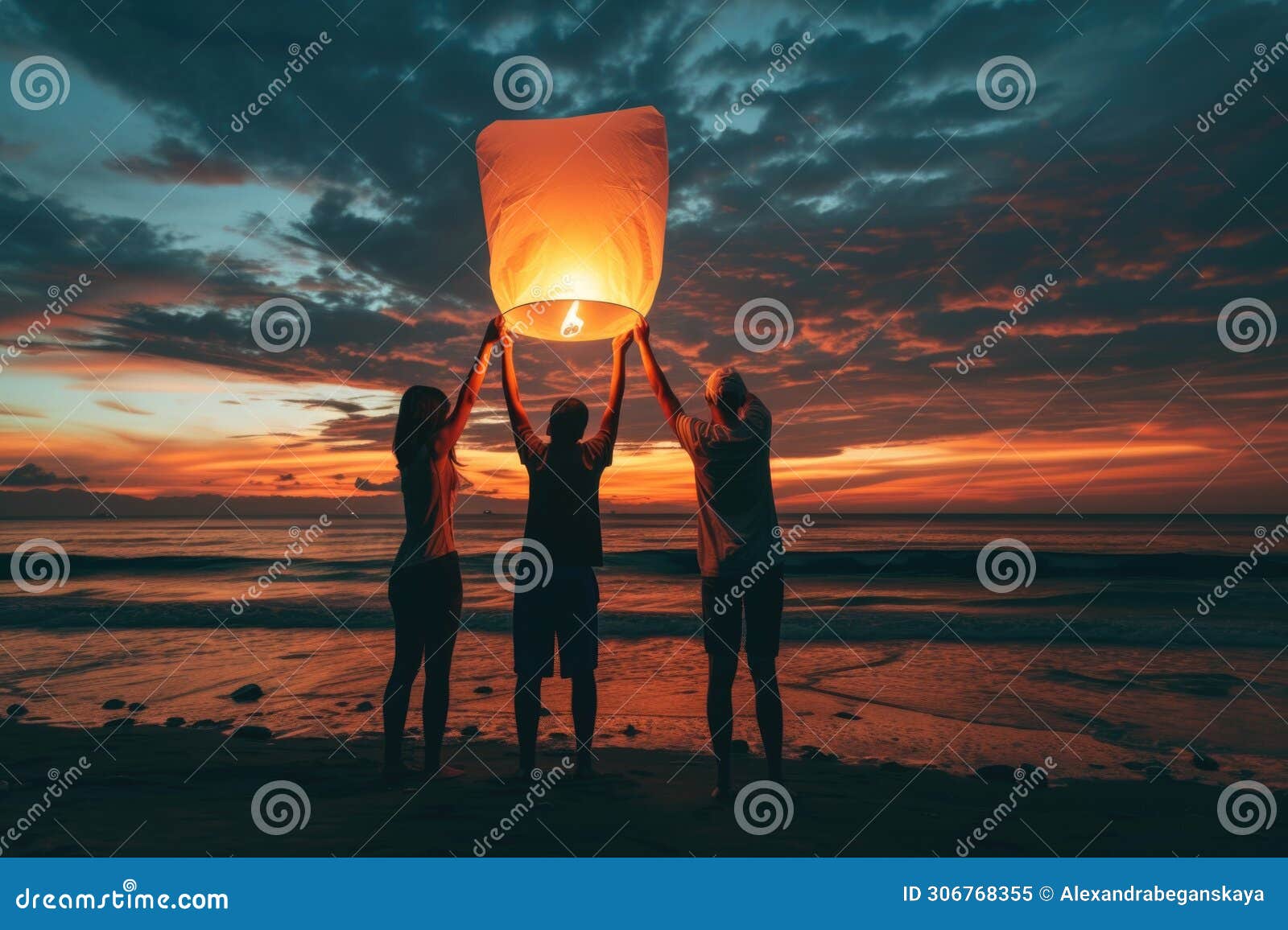People Releasing a Sky Lantern on a Beach at Sunset Stock Illustration ...