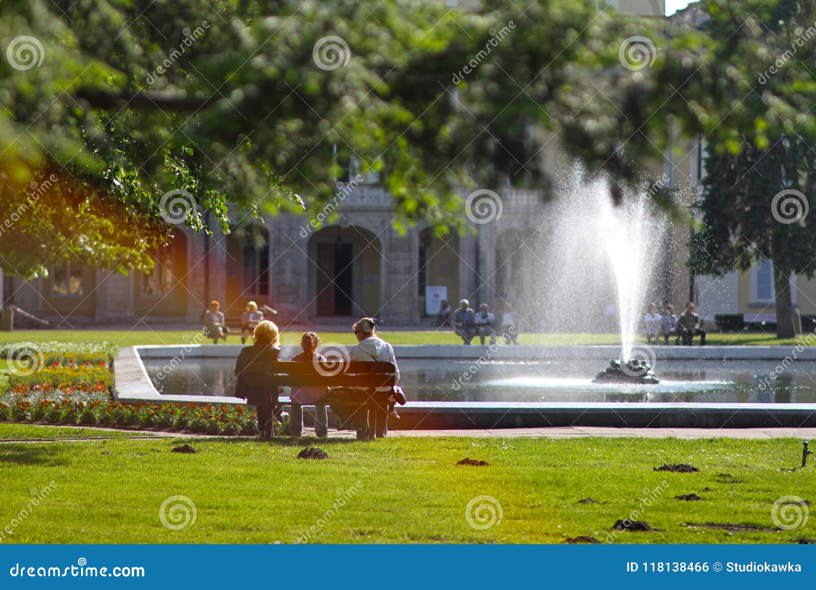 People are Resting on the Bench Near the Fountain Editorial Photo ...