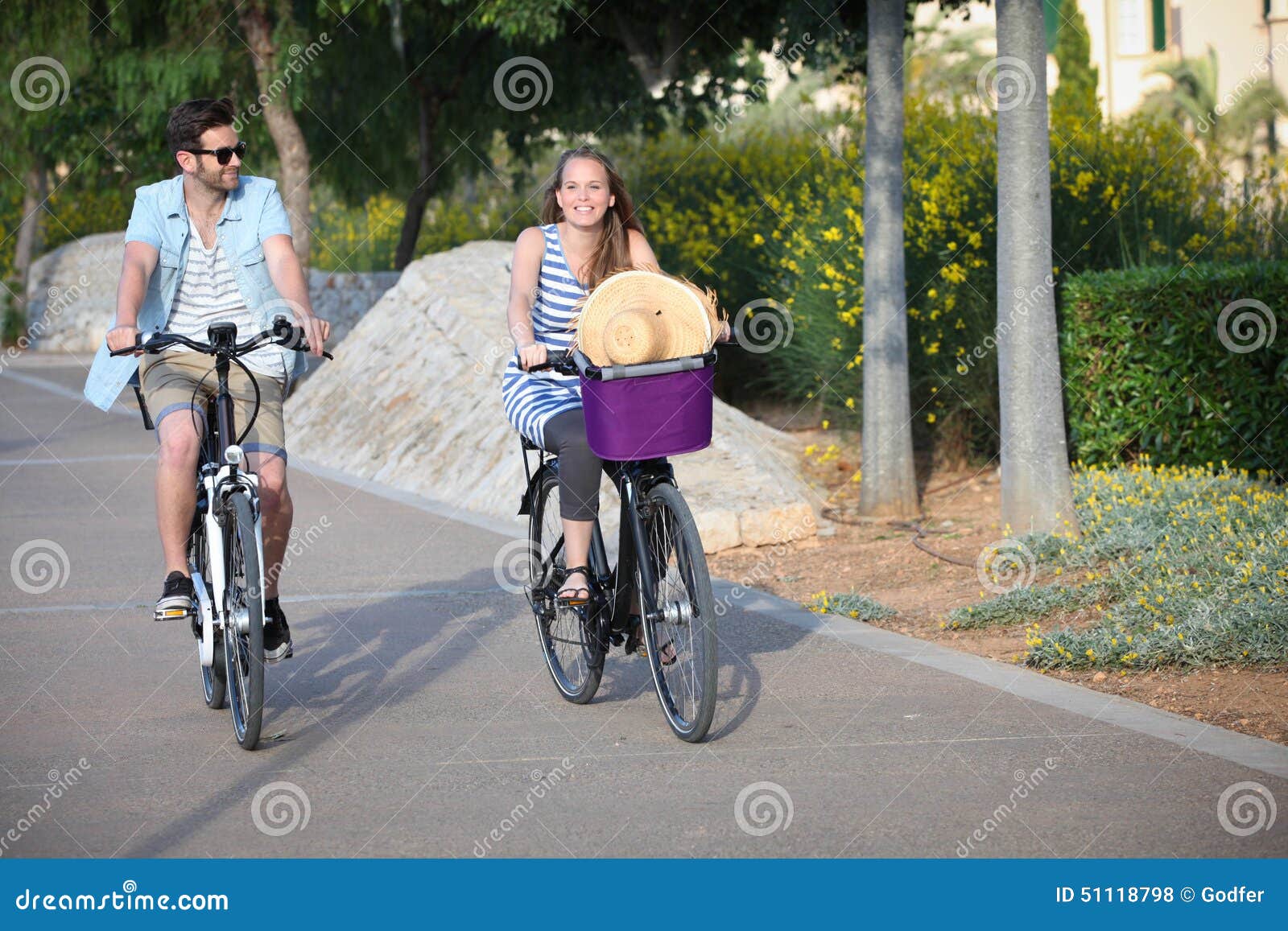 People Riding Rental or Hire Bikes Stock Photo - Image of rented, spain ...