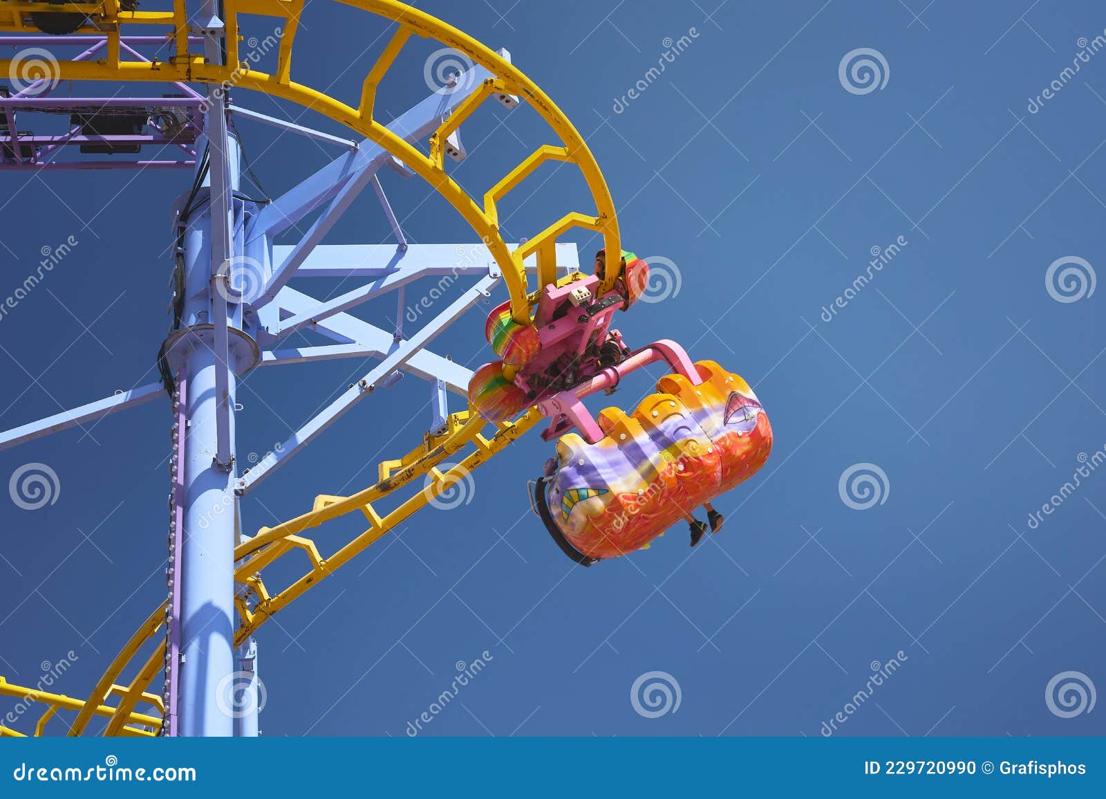 People Riding on a Roller Coaster at an Amusement Park Stock Photo ...
