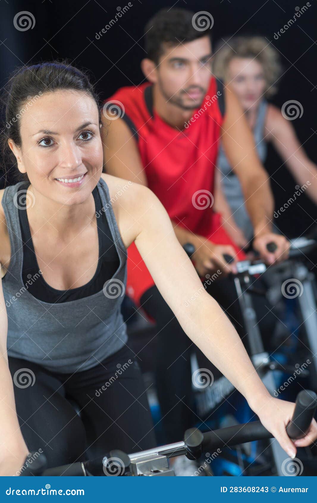 People Riding Stationary Bikes for Exercise Stock Image - Image of ...