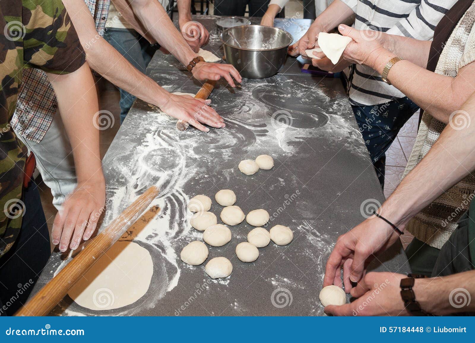 People rolling dough stock photo. Image of meal, ingredients - 57184448