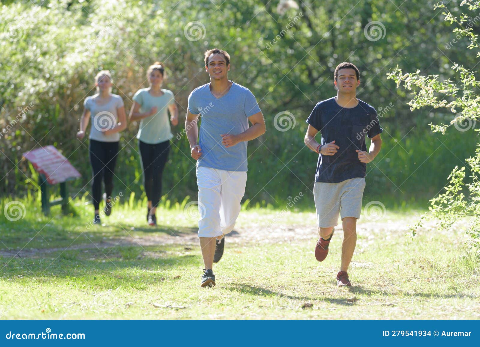 People Running on Jogging Track in Park Stock Photo - Image of energy ...