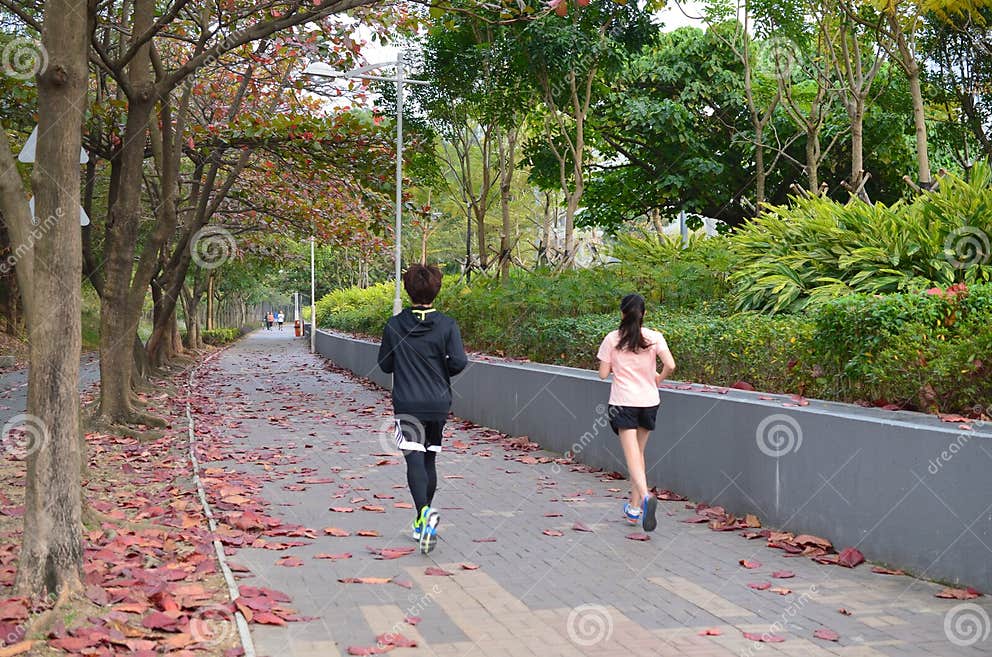 People running on road editorial stock photo. Image of courage - 97204088