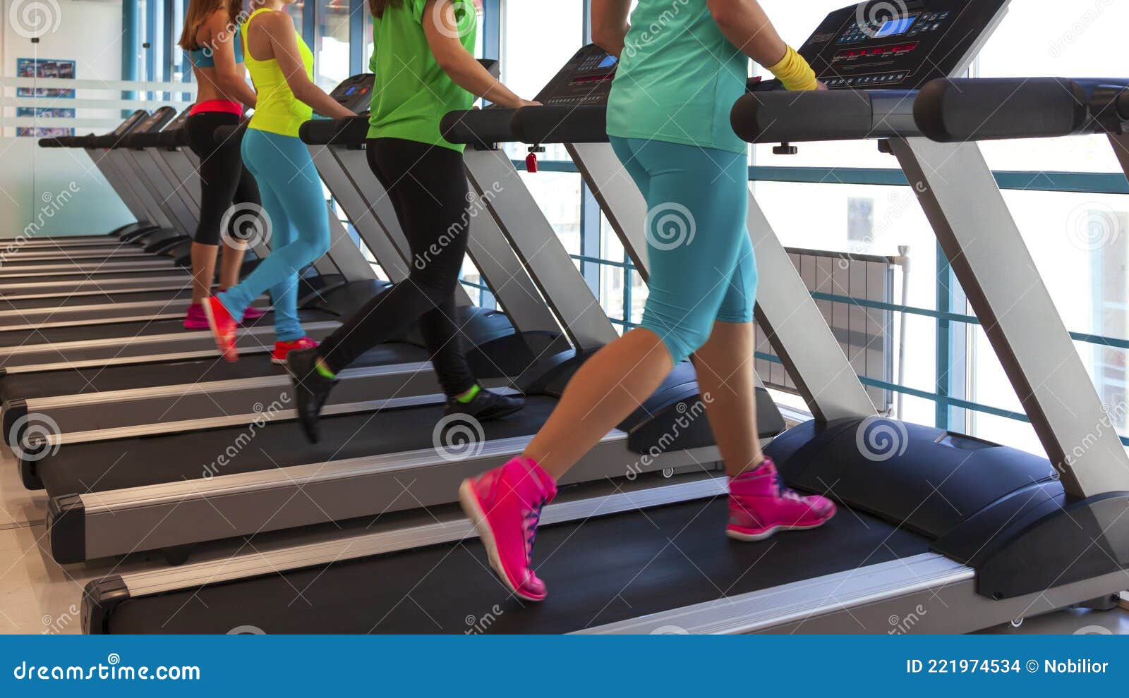People Running on Treadmills in a Gym Stock Photo - Image of machine ...