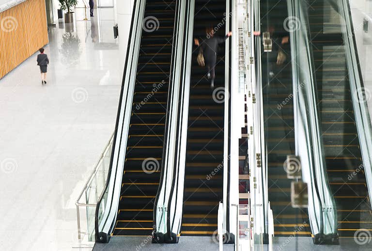 People Rushing on Escalator Stock Photo - Image of corporate, business ...