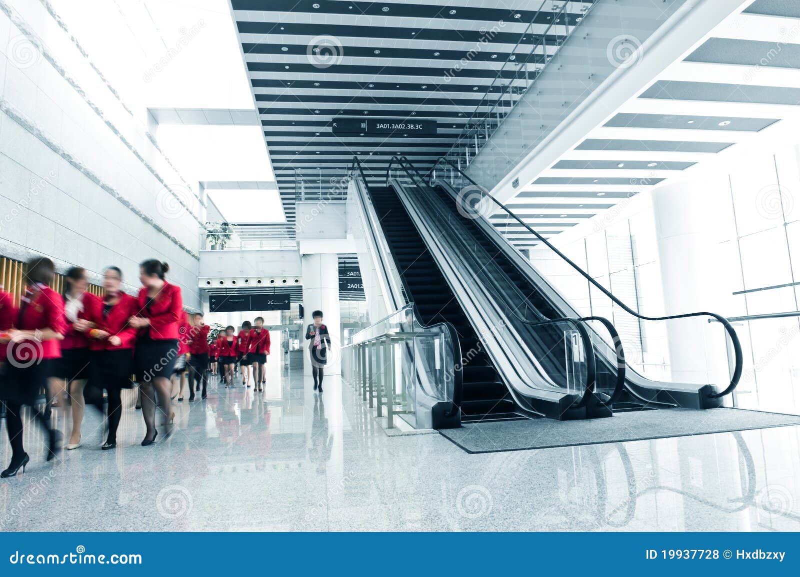 People Rushing on Escalator Stock Photo - Image of airport, busy: 19937728