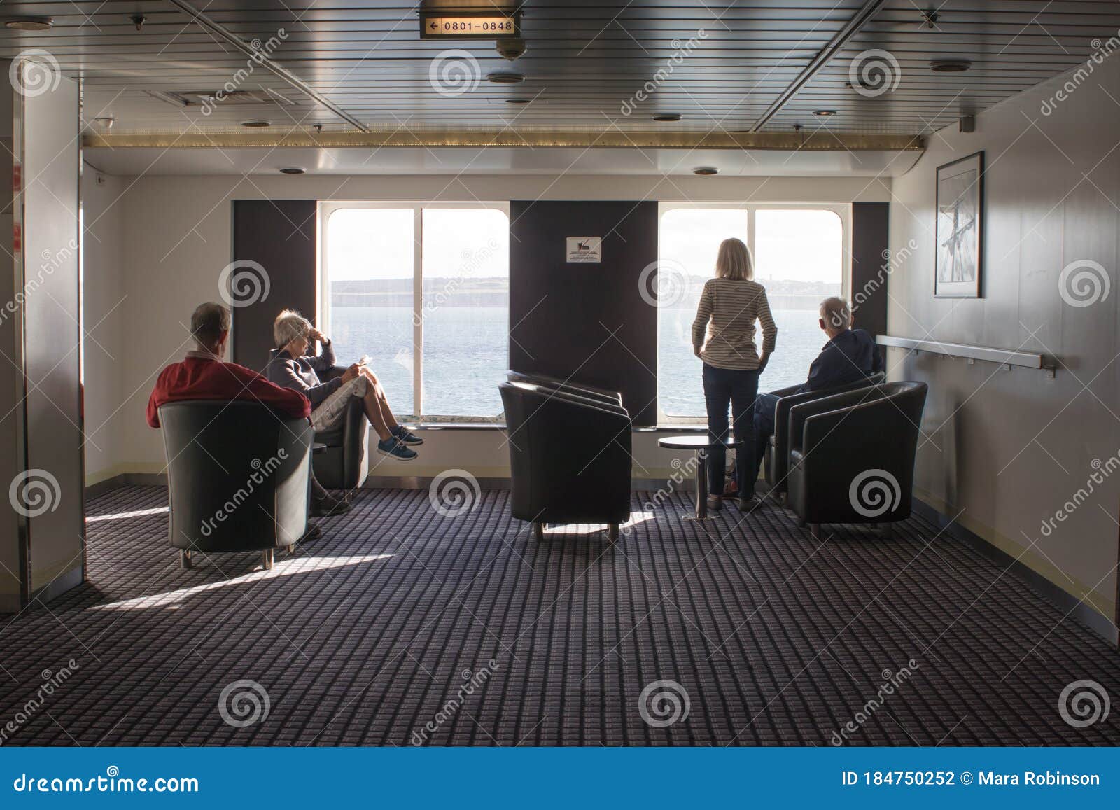 People Sat In A Chairs In The Public Seating Area Inside A Ferry By The ...