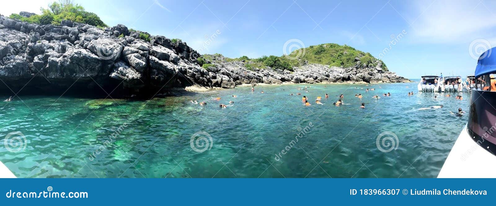 People in the Sea, Swim and Dive Around the Cliff Stock Image - Image ...