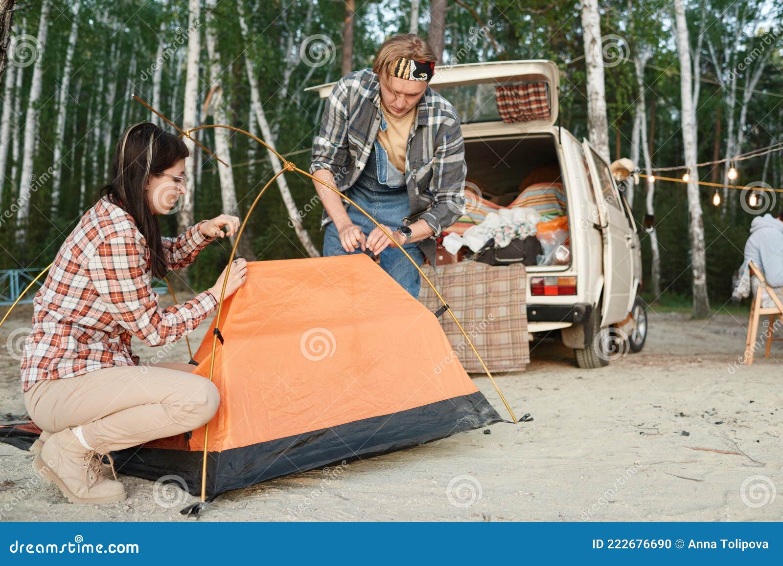 People setting up tents stock photo. Image of summer - 222676690
