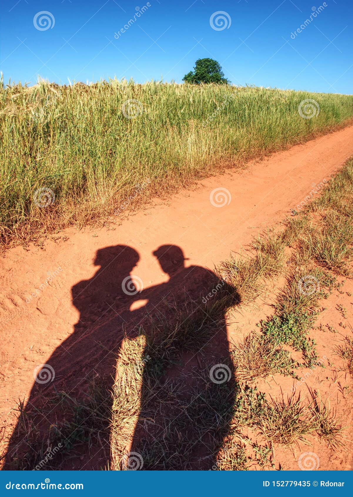 People Shadows on Old Dusty Road with Ferric Red Soil. Shadows Stock ... People Shadows on Old Dusty Road with Ferric Red Soil. Shadows Stock ...