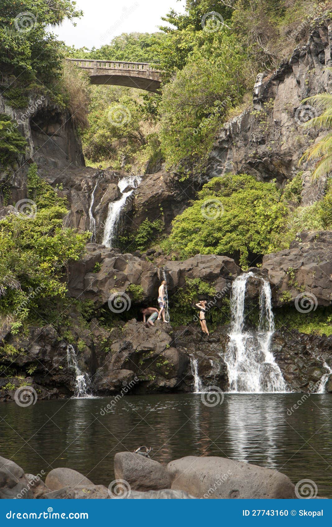 People Showering Under Waterfalls Stock Photo - Image of water, rapid ...