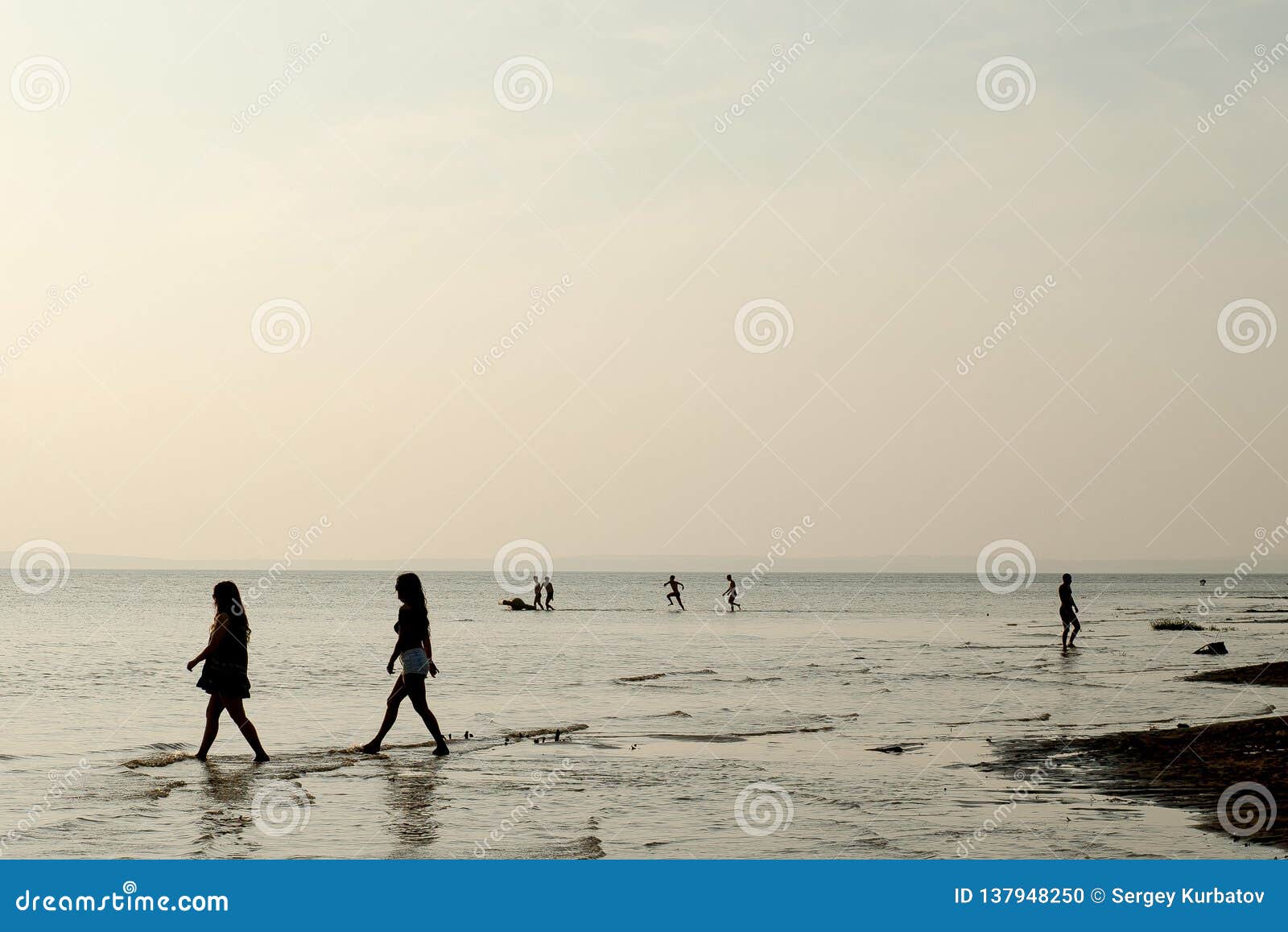 People Silhouette on the Coast of the Sea. Sepia Stock Photo - Image of ...